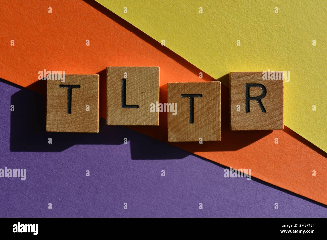 TLTR acronym for Too Long To Read in wooden alphabet letters isolated ...