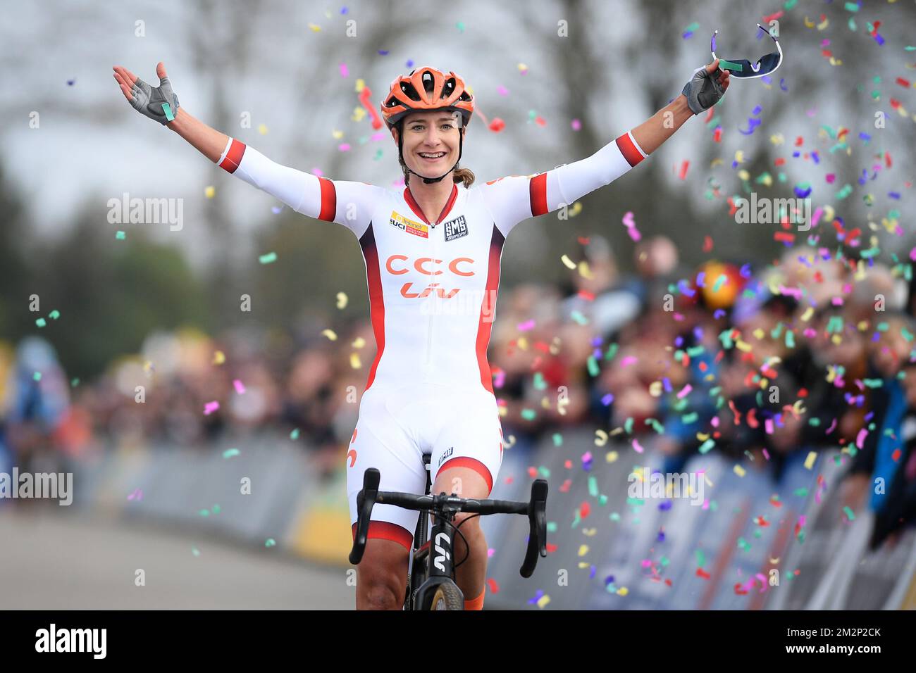 Dutch Marianne Vos celebrates as she crosses the finish line to win the ...
