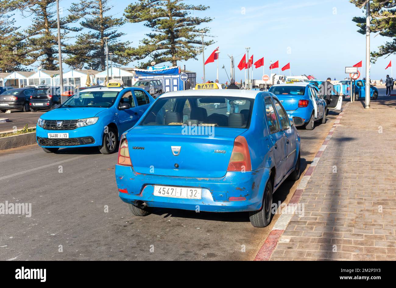 Blue Dacia Logan cars used as small local taxis, Petits Taxi, Essaouira ...