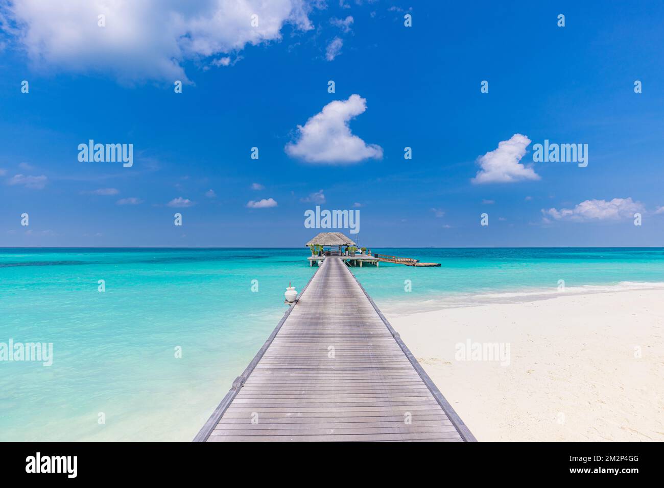 Overwater bungalow in the Indian Ocean, shore coast landscape. Tropical ...