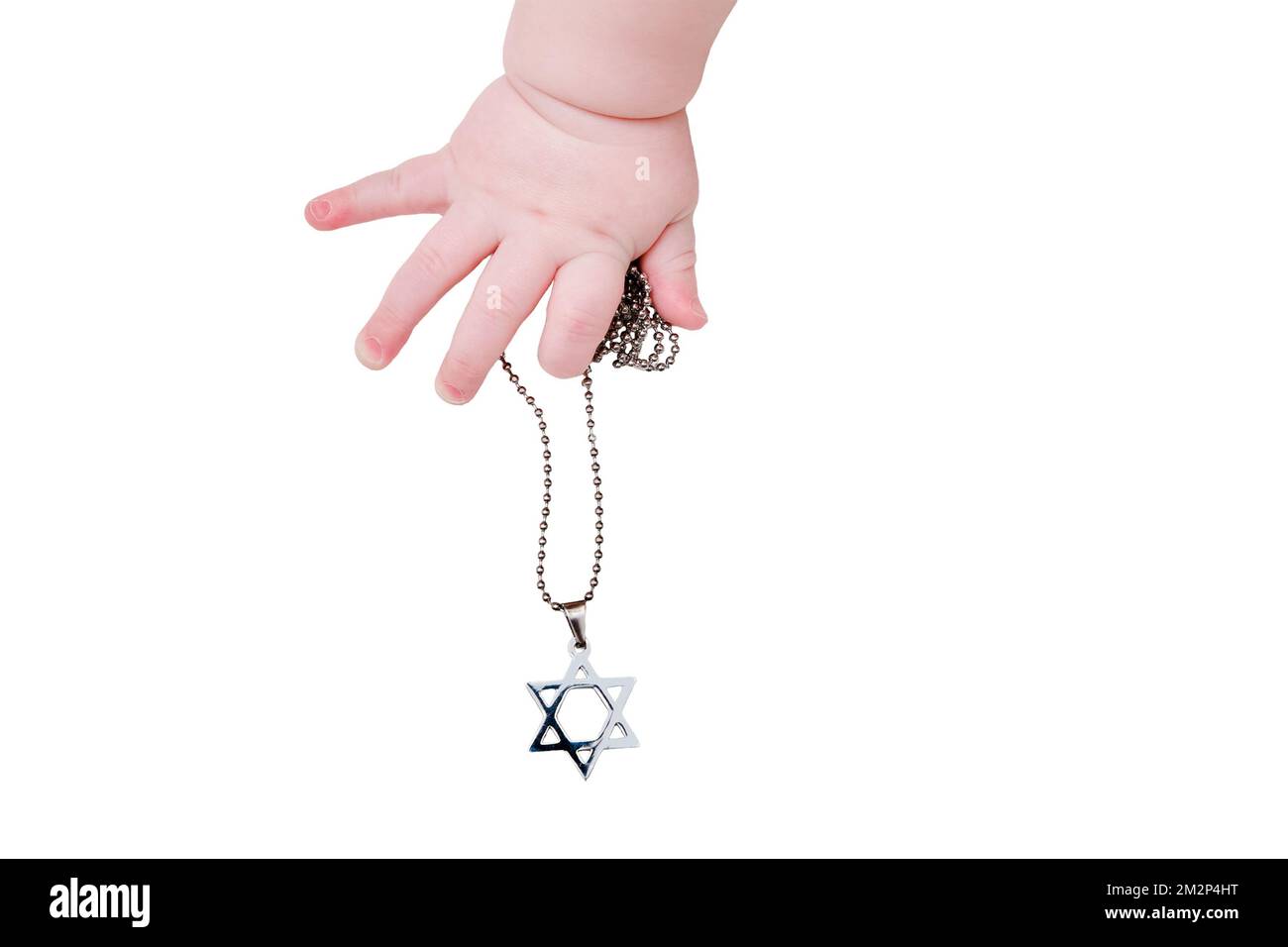 Baby hand and Jewish religious symbol is the star of David, close-up ...