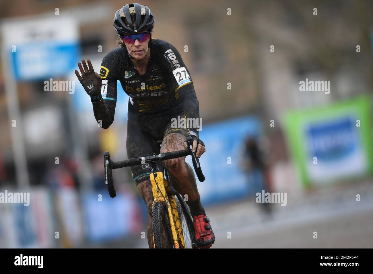 Belgian Ellen Van Loy crosses the finish line at the women's elite race ...
