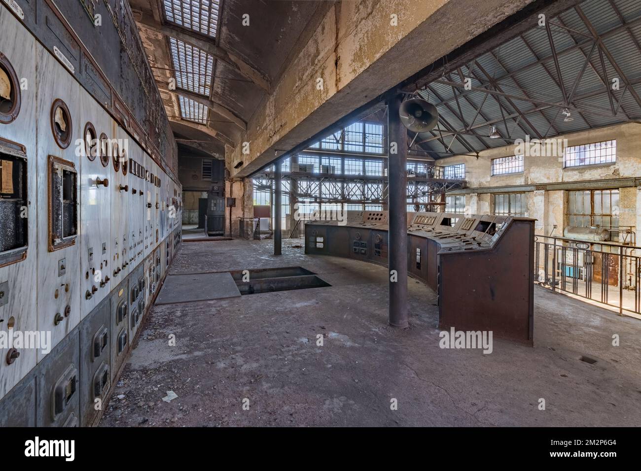 An interior shot of a large control panel in a turbine hall of a ...