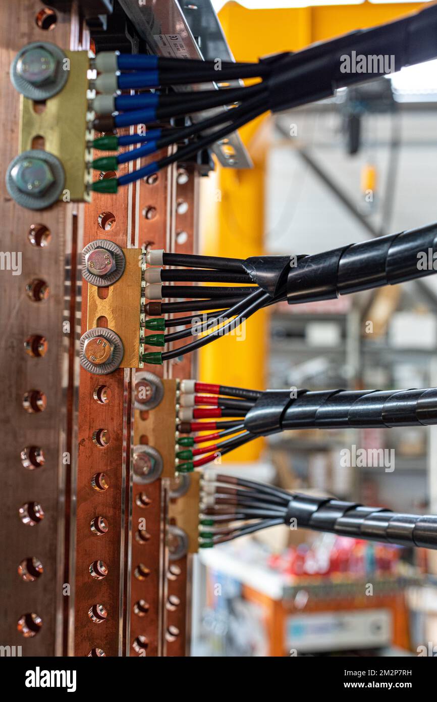 A close-up of an electrical wire connection protected by electrical ...