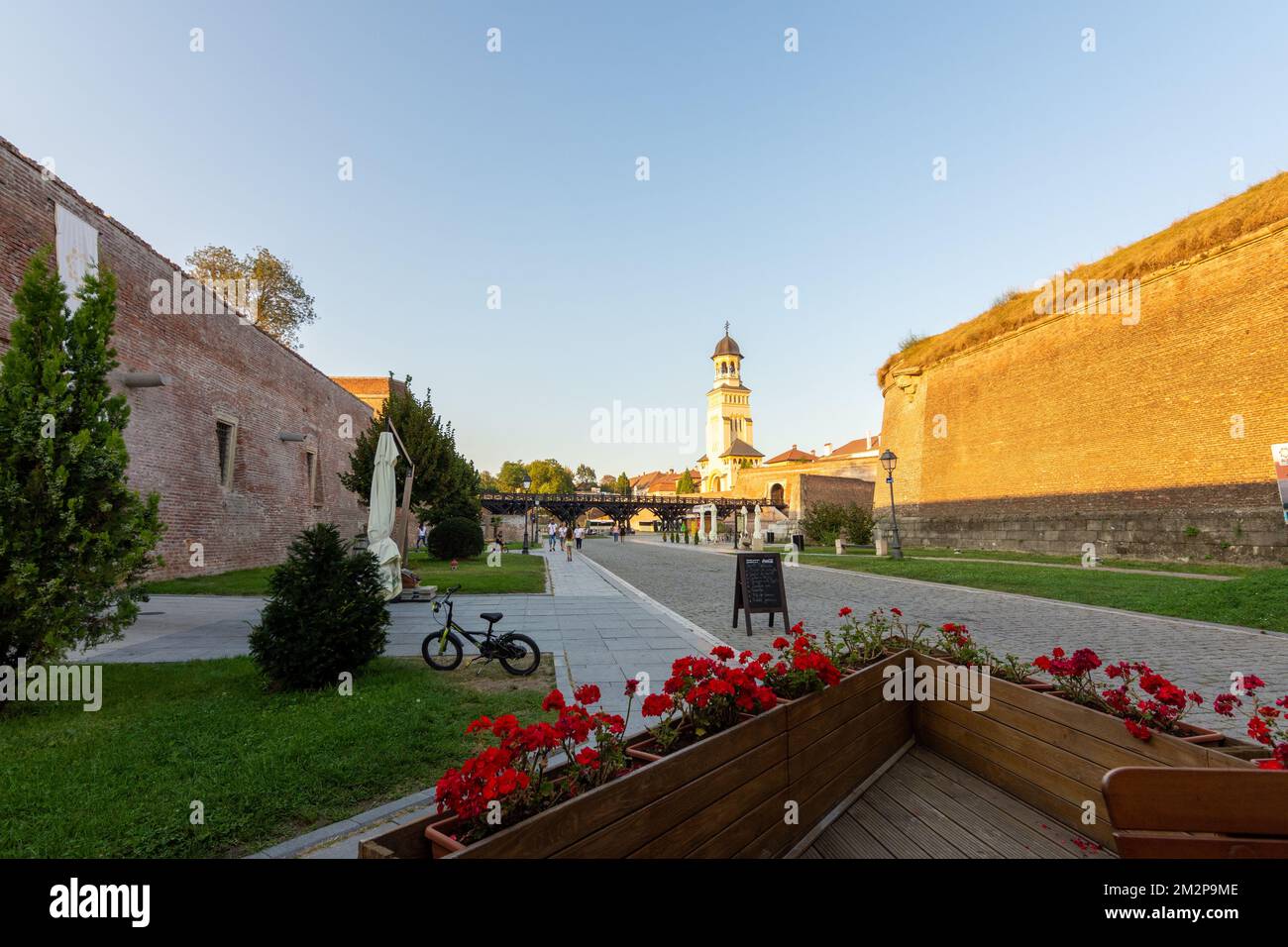 A path in the Alba Iulia Fortress on the sunrise Stock Photo - Alamy