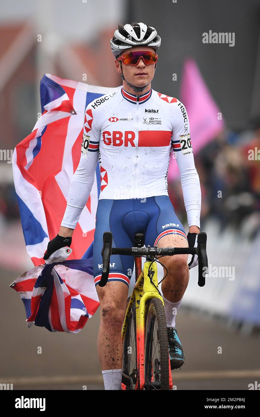 British Thomas Pidcock celebrates as he crosses the finish line to win ...