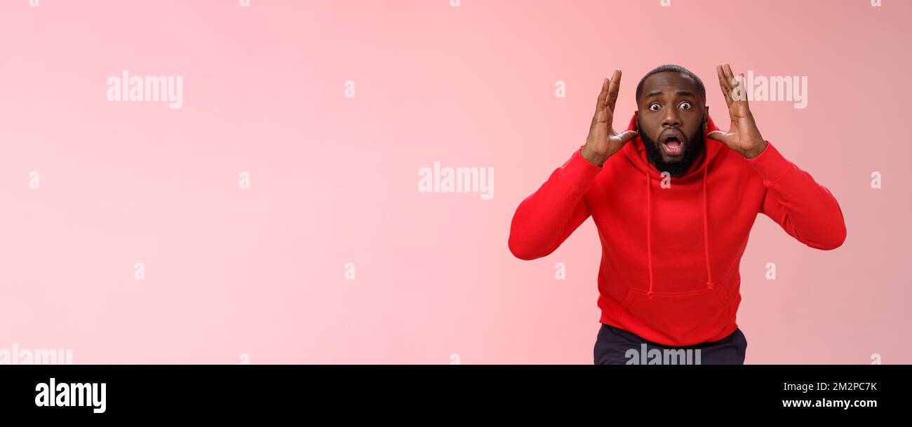 Freaked out panic worried young insecure african american man go crazy ...