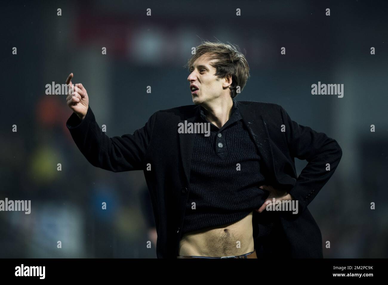 a streaker pictured in action during a soccer game between KV Mechelen ...