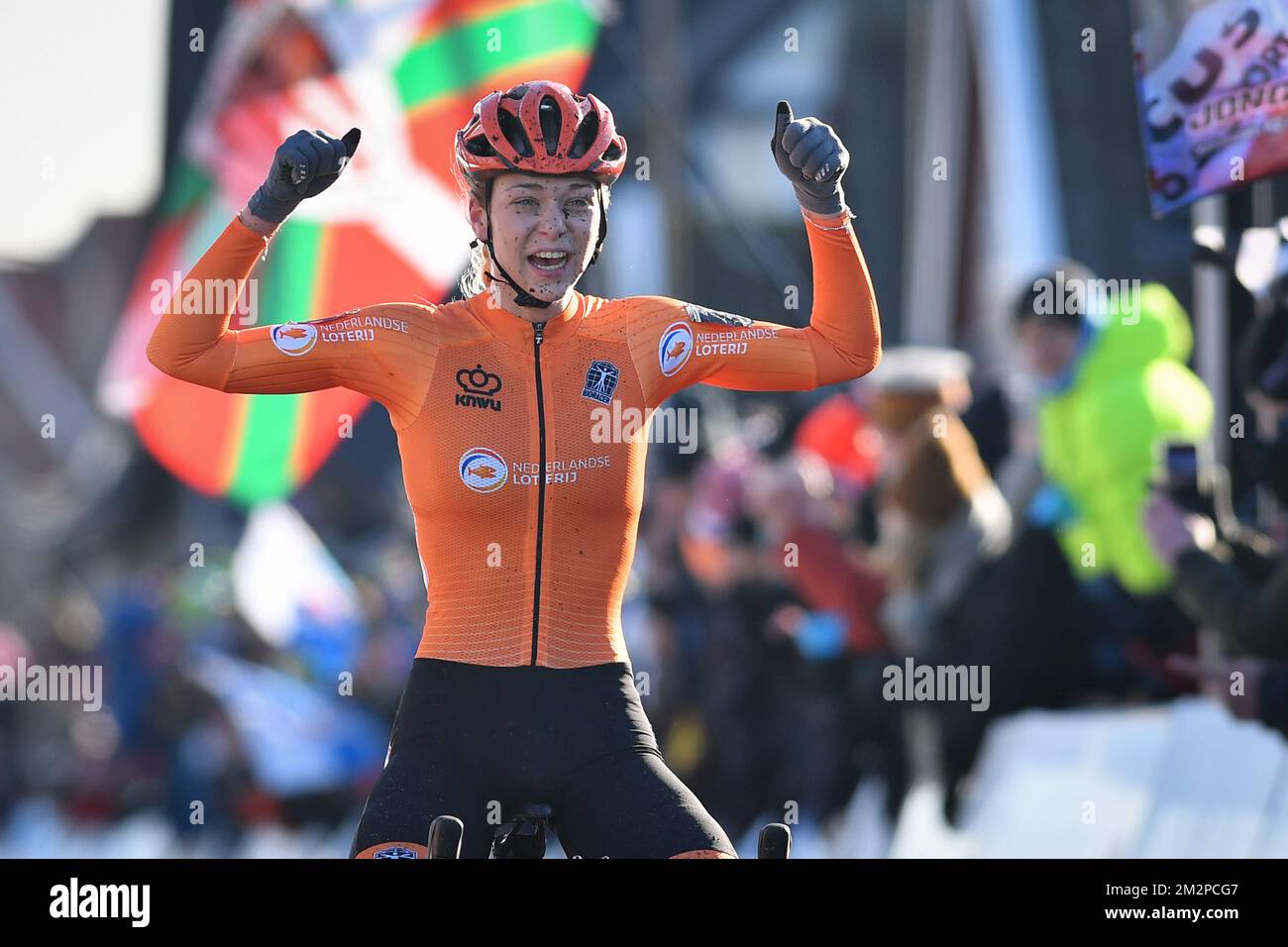 Dutch Inge van der Heijden celebrates as she crosses the finish line to ...