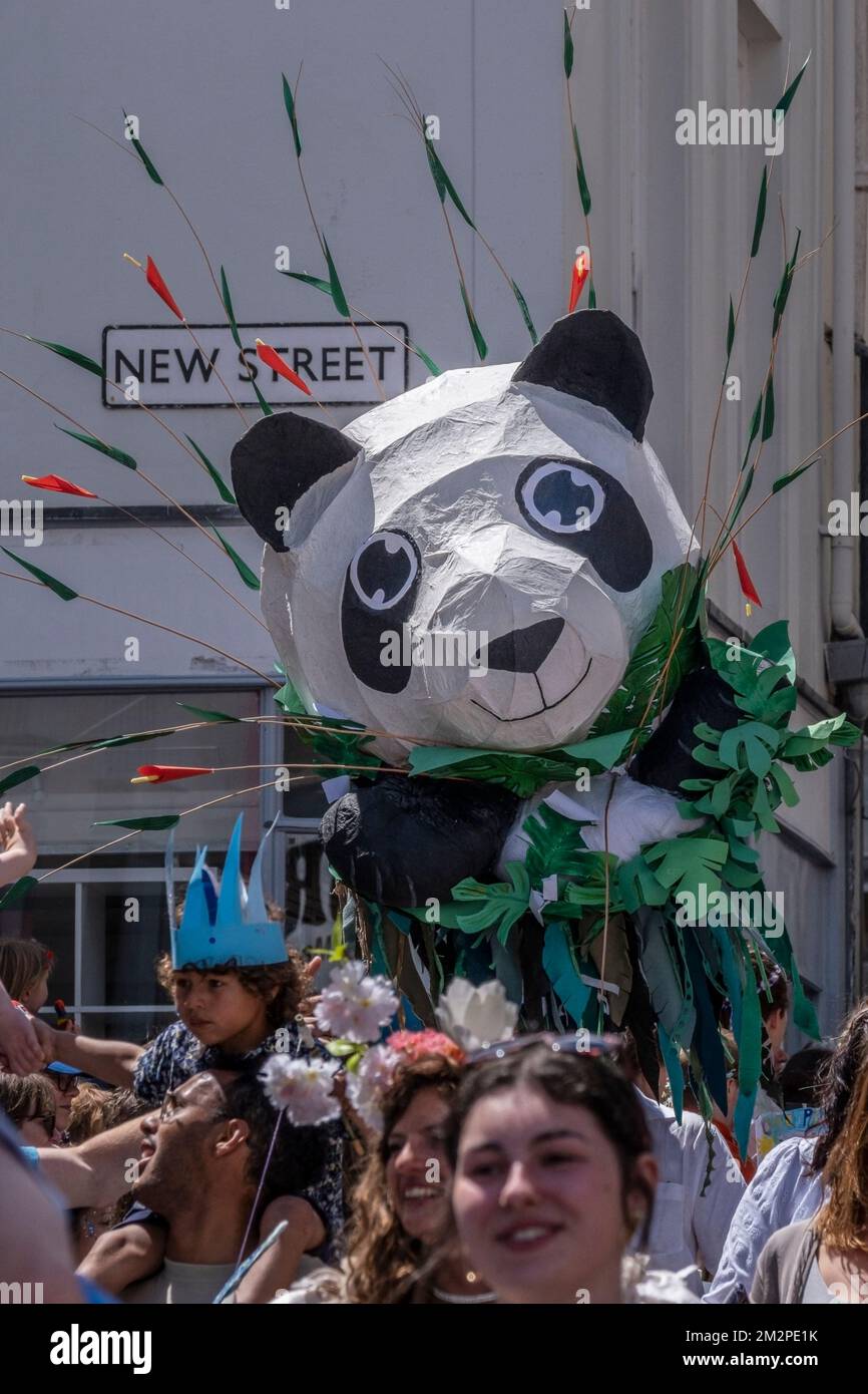 People carrying a large withy and paper structure of a Panda in the ...