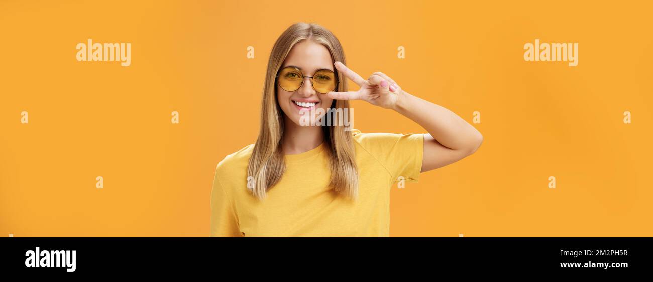 Cute optimistic and friendly young caucasian woman with fair hair in ...