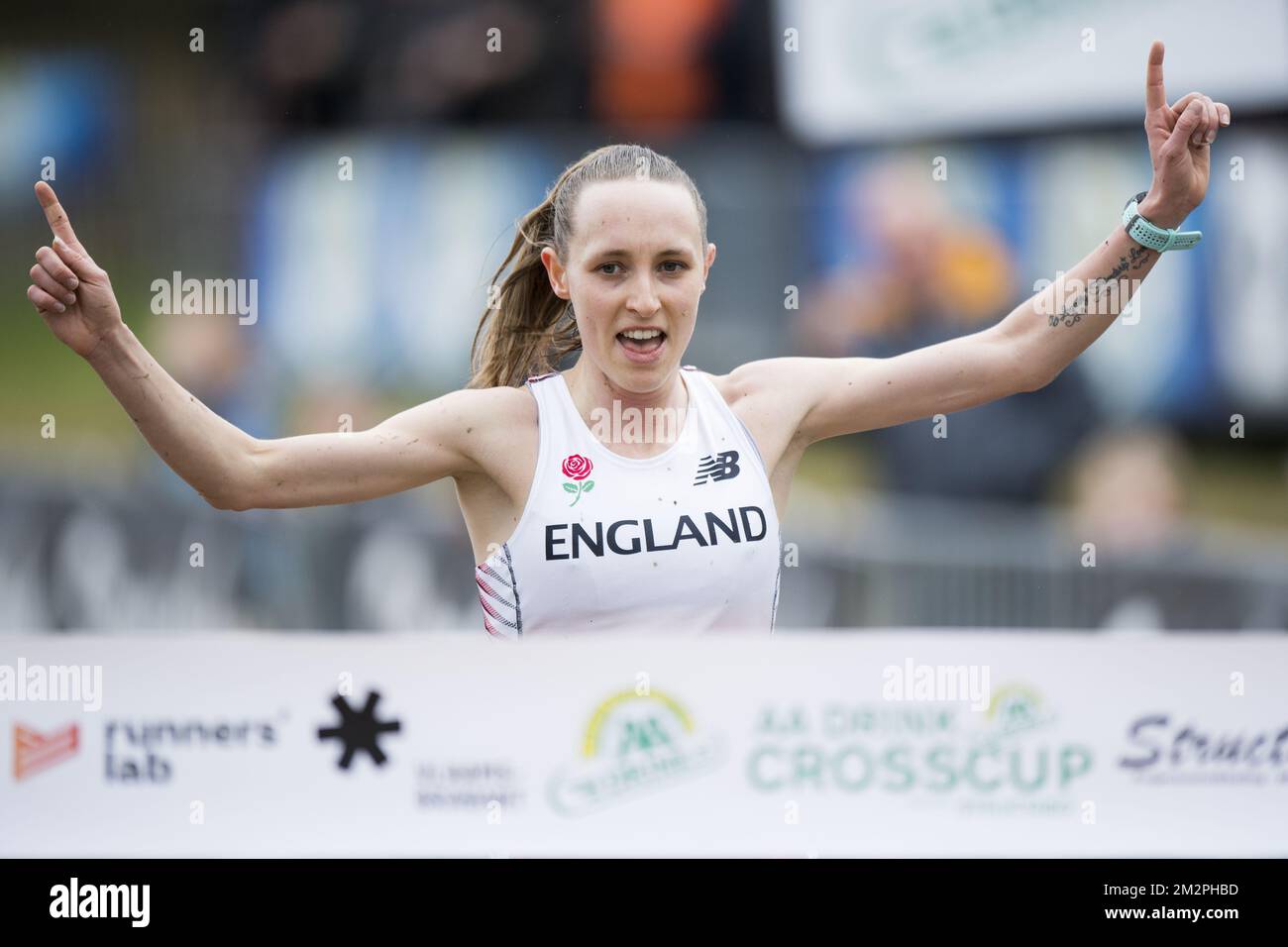 Kate Holt celebrates after winning the women's race at the fifth stage ...