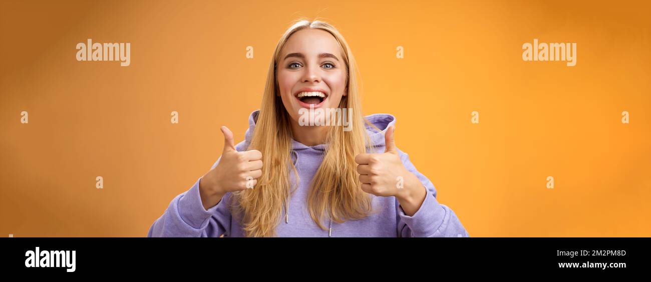 Supportive cute blond girlfriend cheering liking interesting concept ...