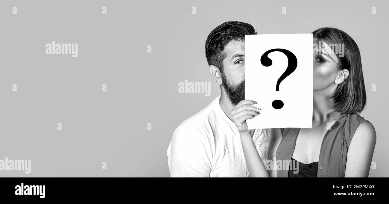 Couple holding paper question mark. Problems and solutions. Couple in ...