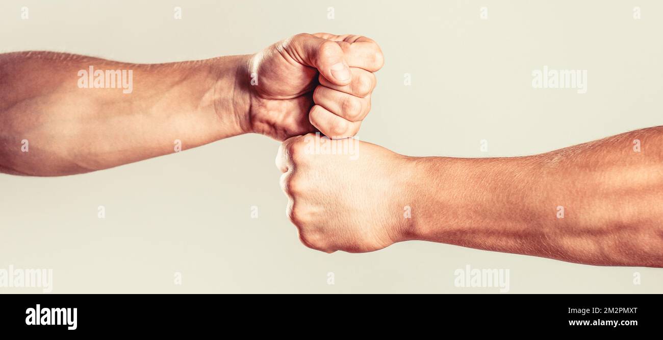 Team concept. People bumping their fists together, arms. Friendly ...