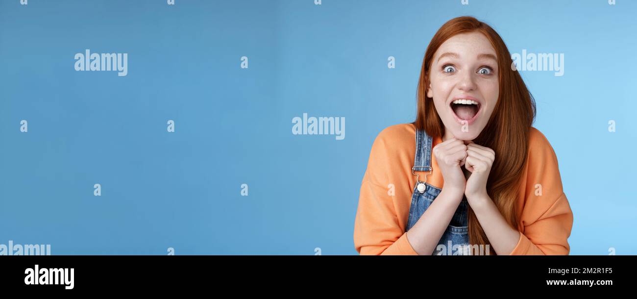Cute redhead european girl blue eyes freckles reacting amused shocking ...
