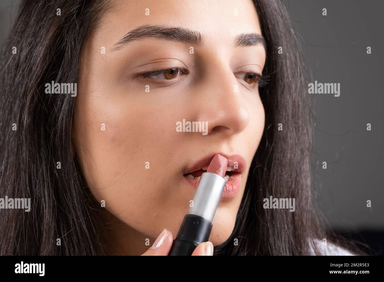 Applying to lips hi-res stock photography and images - Alamy