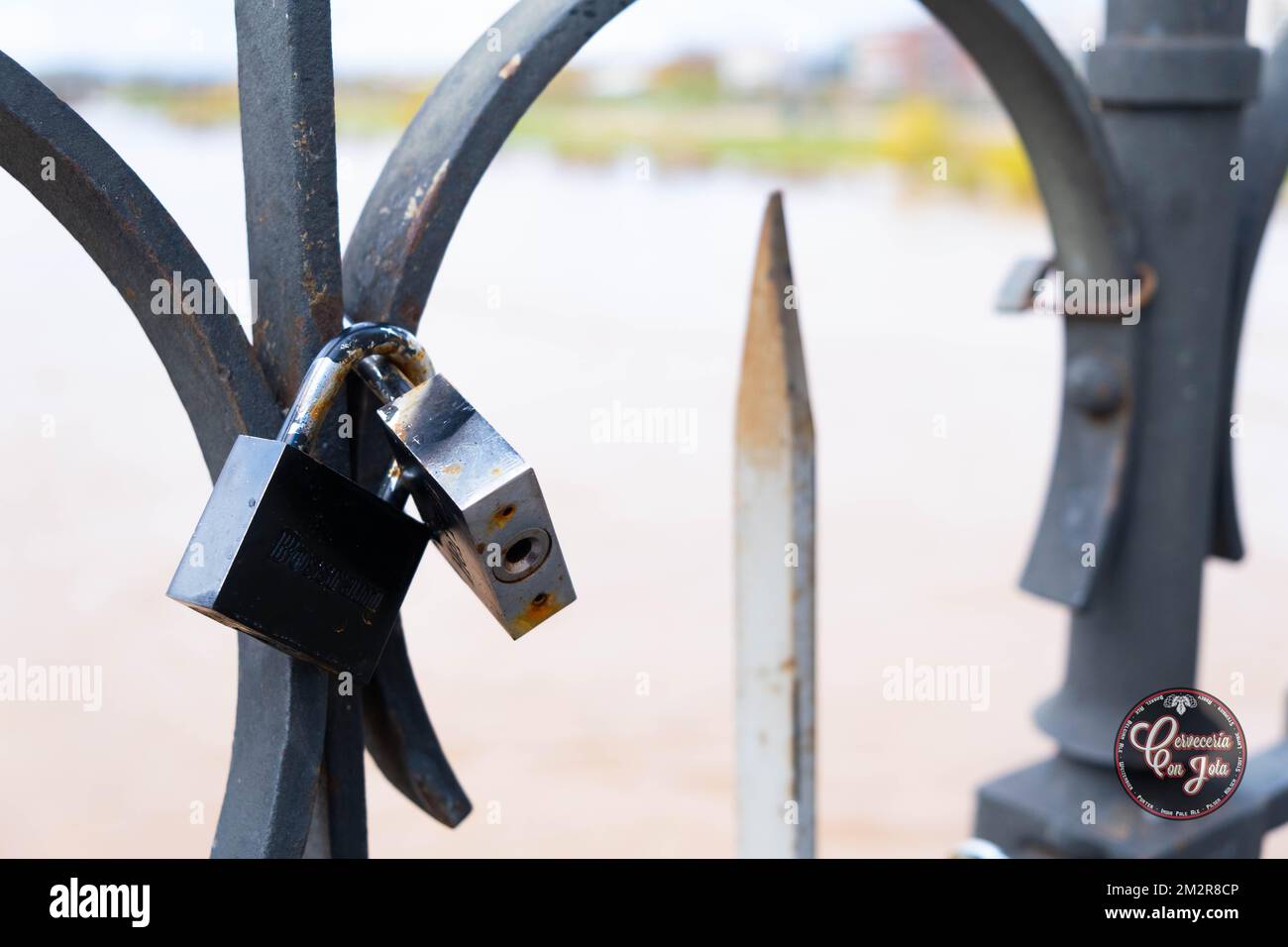 Close-Up Of Padlocks Hanging On Rusty Metallic Gate Stock Photo - Alamy