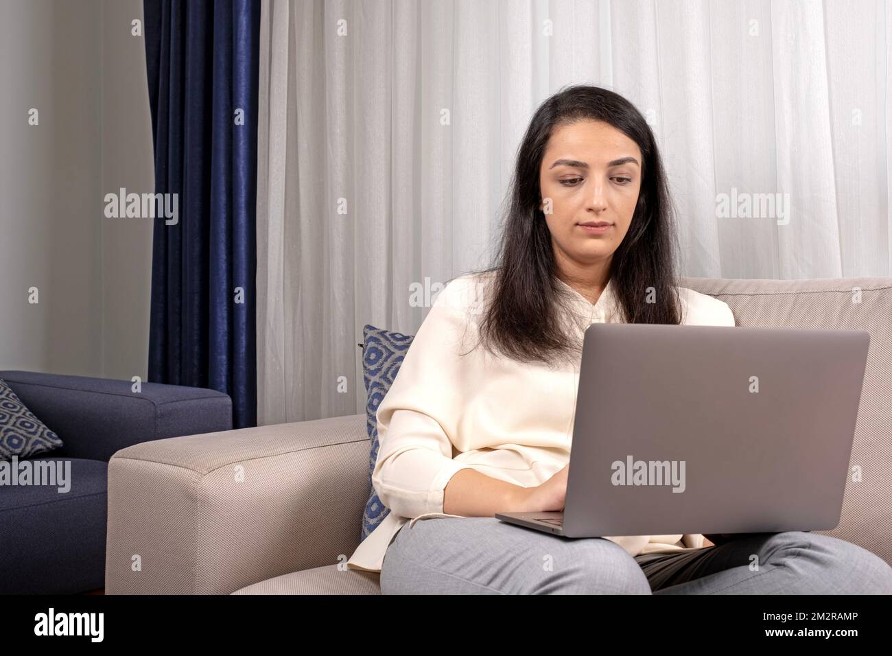 Woman working laptop pc sitting hi-res stock photography and images - Alamy