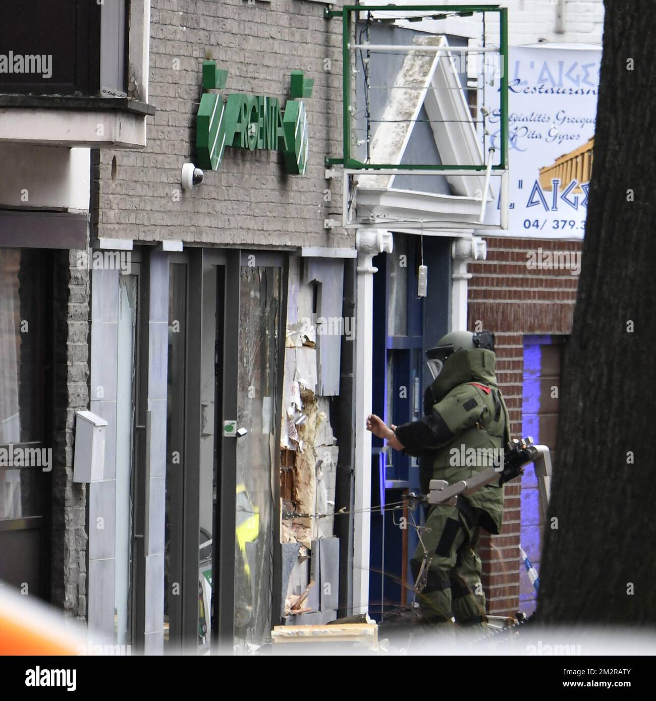 Illustration shows an explosives team with robot in action on the scene ...