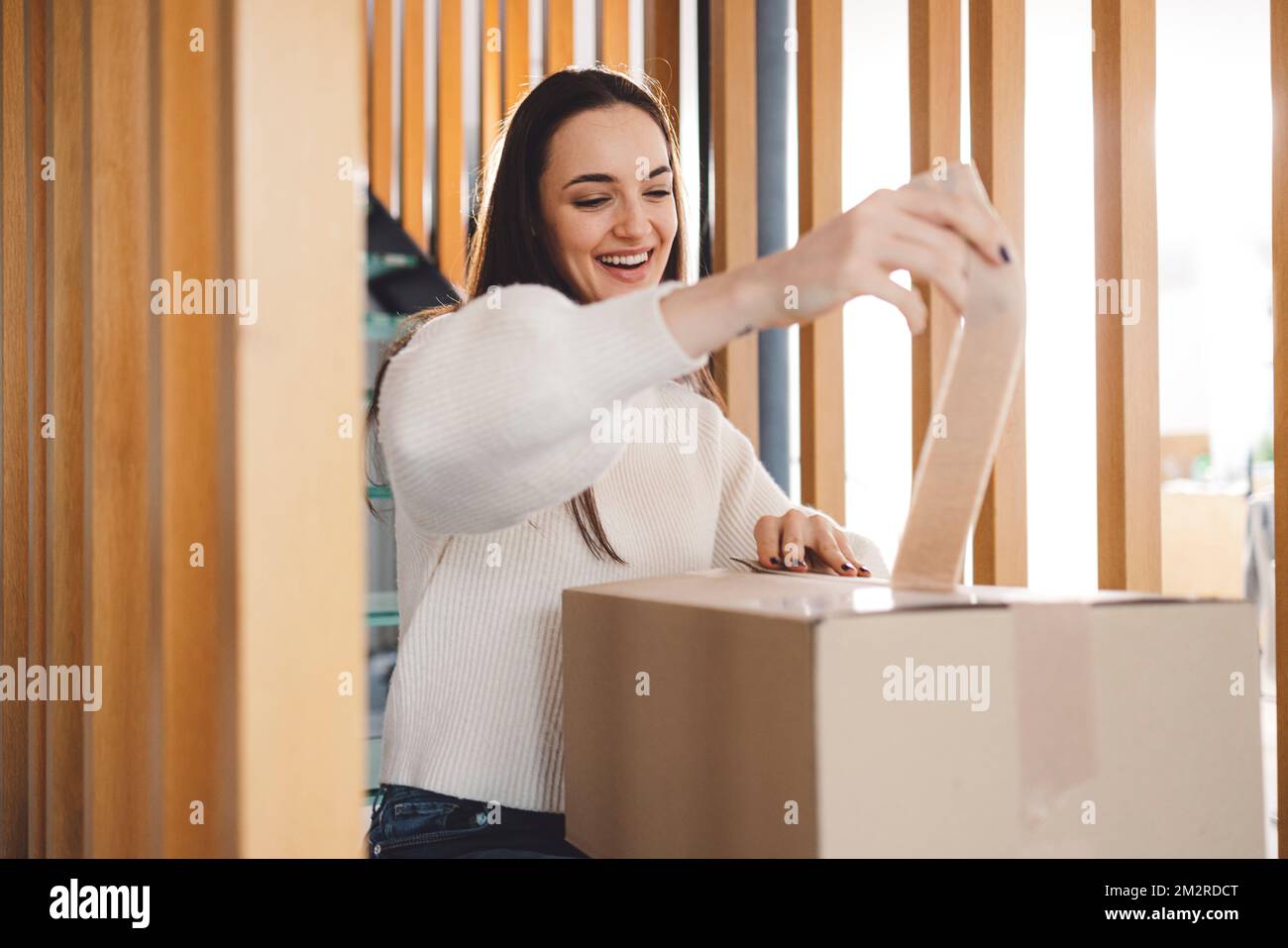Opening new package hi-res stock photography and images - Alamy