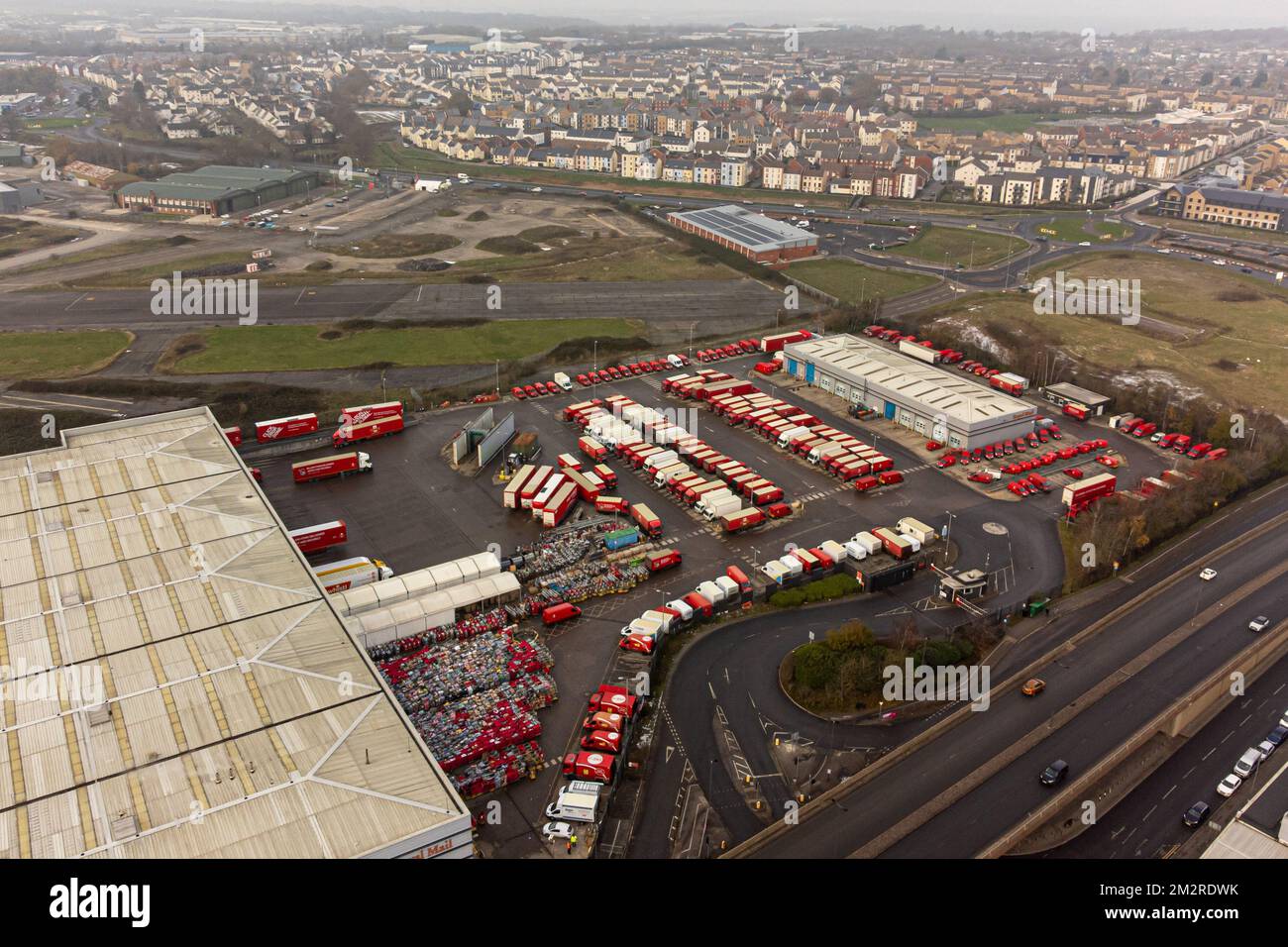 Royal Mail delivery vehicles and cages of mail at the Bristol Filton ...