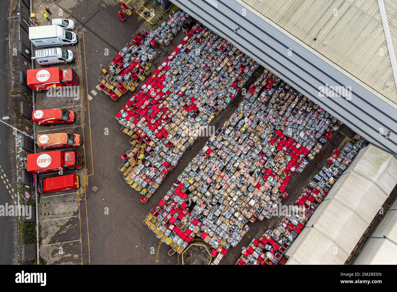 Royal Mail delivery vehicles and cages of mail at the Bristol Filton ...