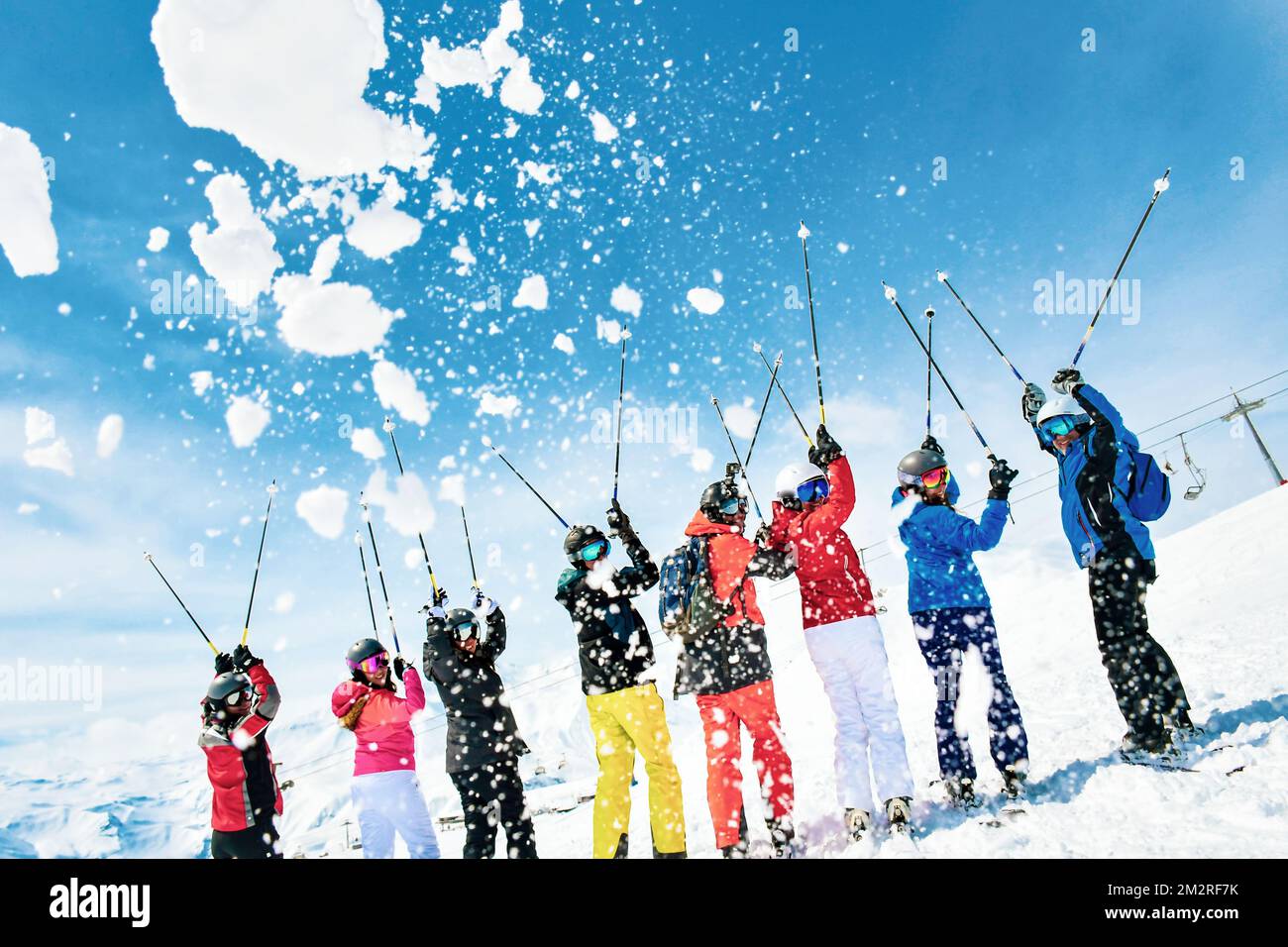 Four Couples Eight Friends Group Of Skiers On Holiday In Ski Resort
