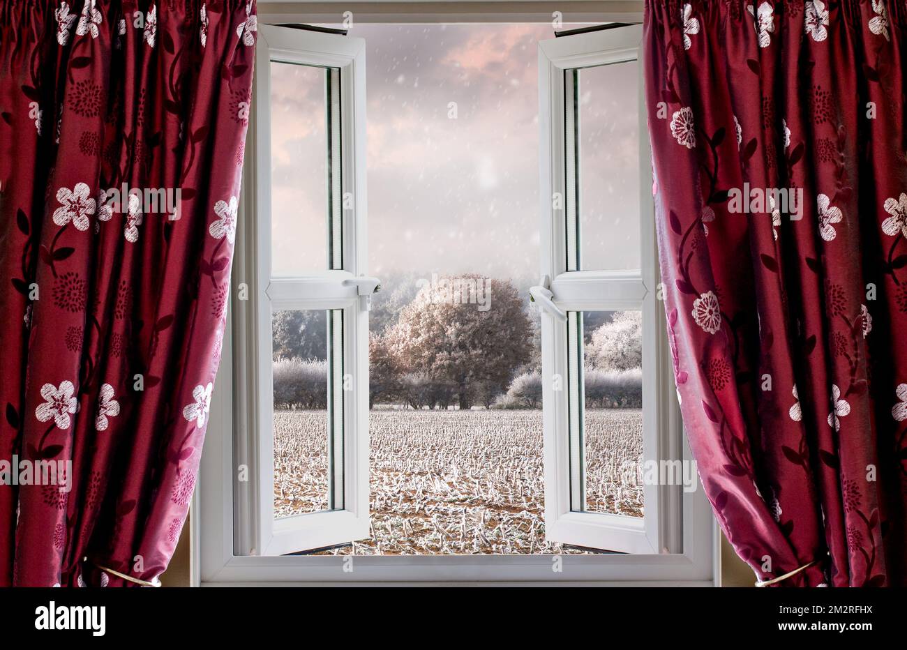 Window open with beautiful view onto rural winter landscape. Red ...
