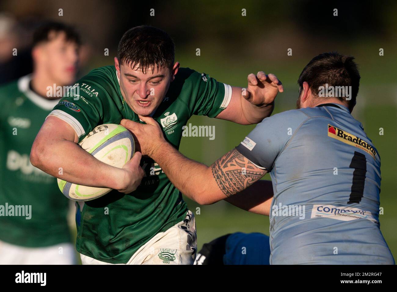 Rugby players in action Stock Photo - Alamy