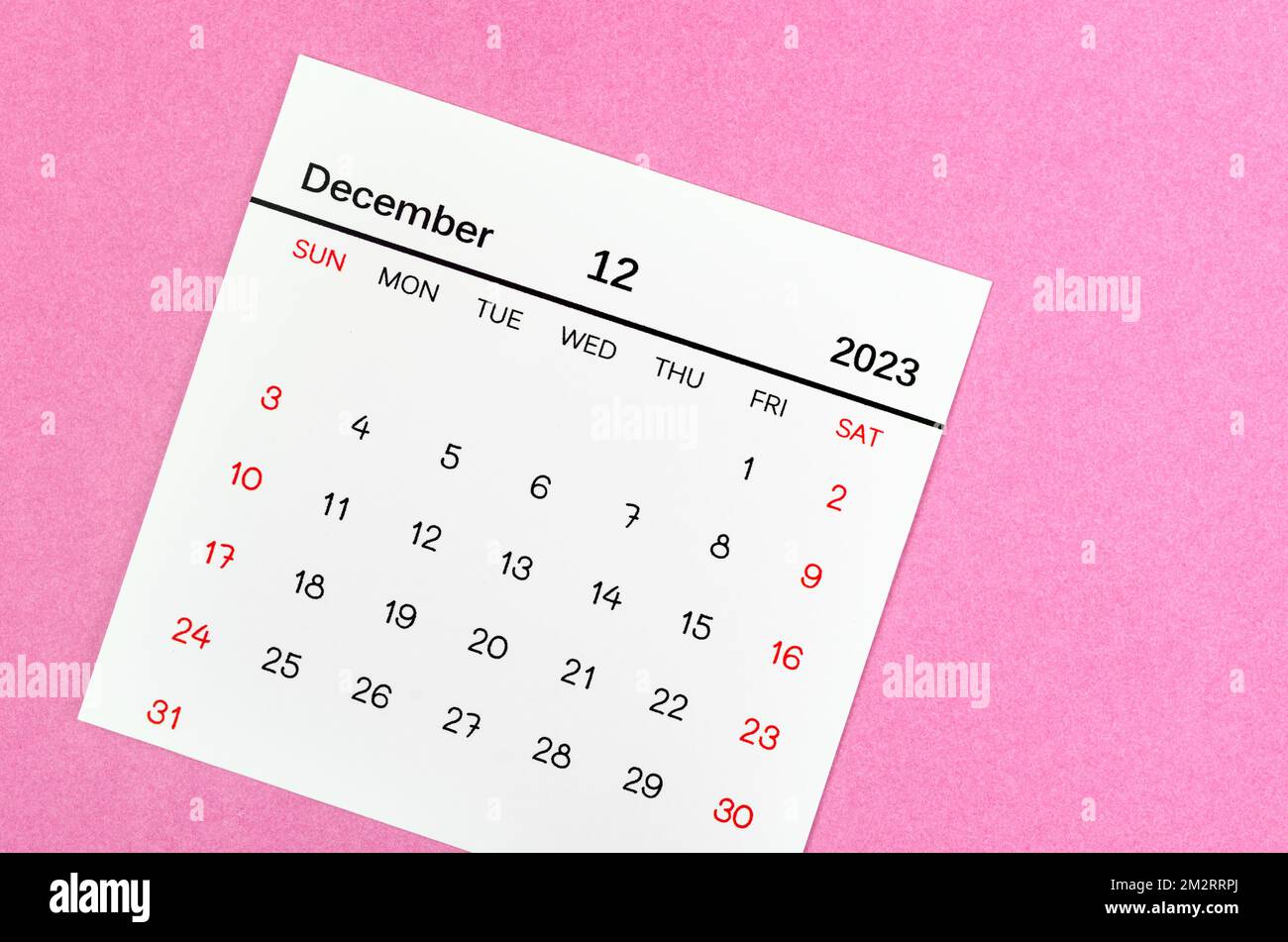 December 2023 Monthly calendar for 2023 year on pink background Stock ...