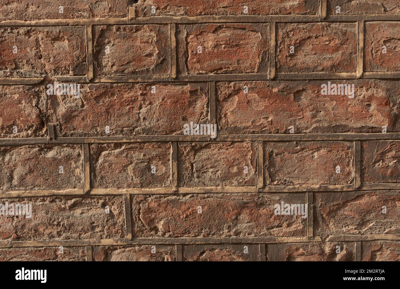 The texture of the old brickwork with special inserts. Close-up ...