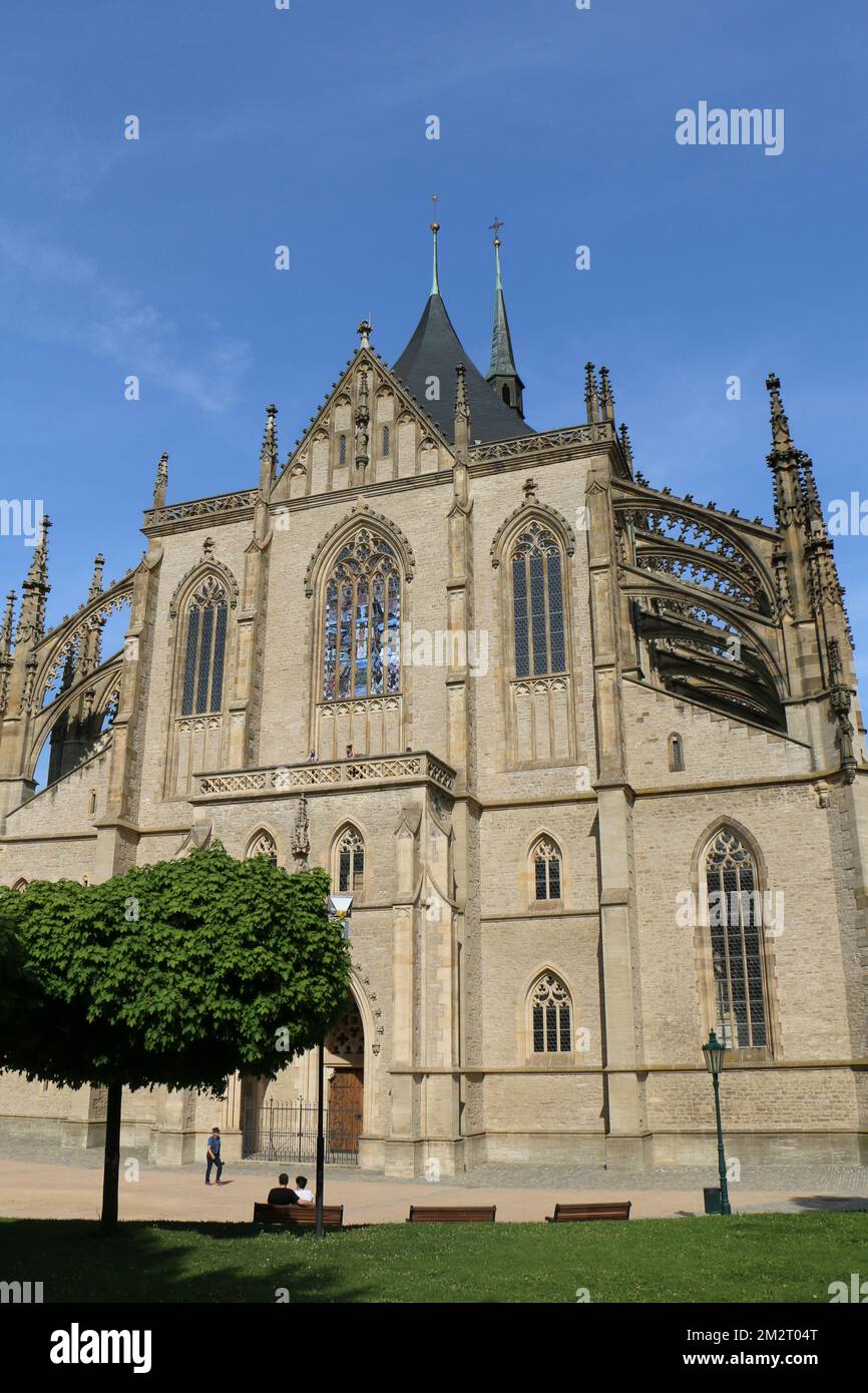 A vertical shot of the Cathedral of St Barbara under blue sky in Kutna ...