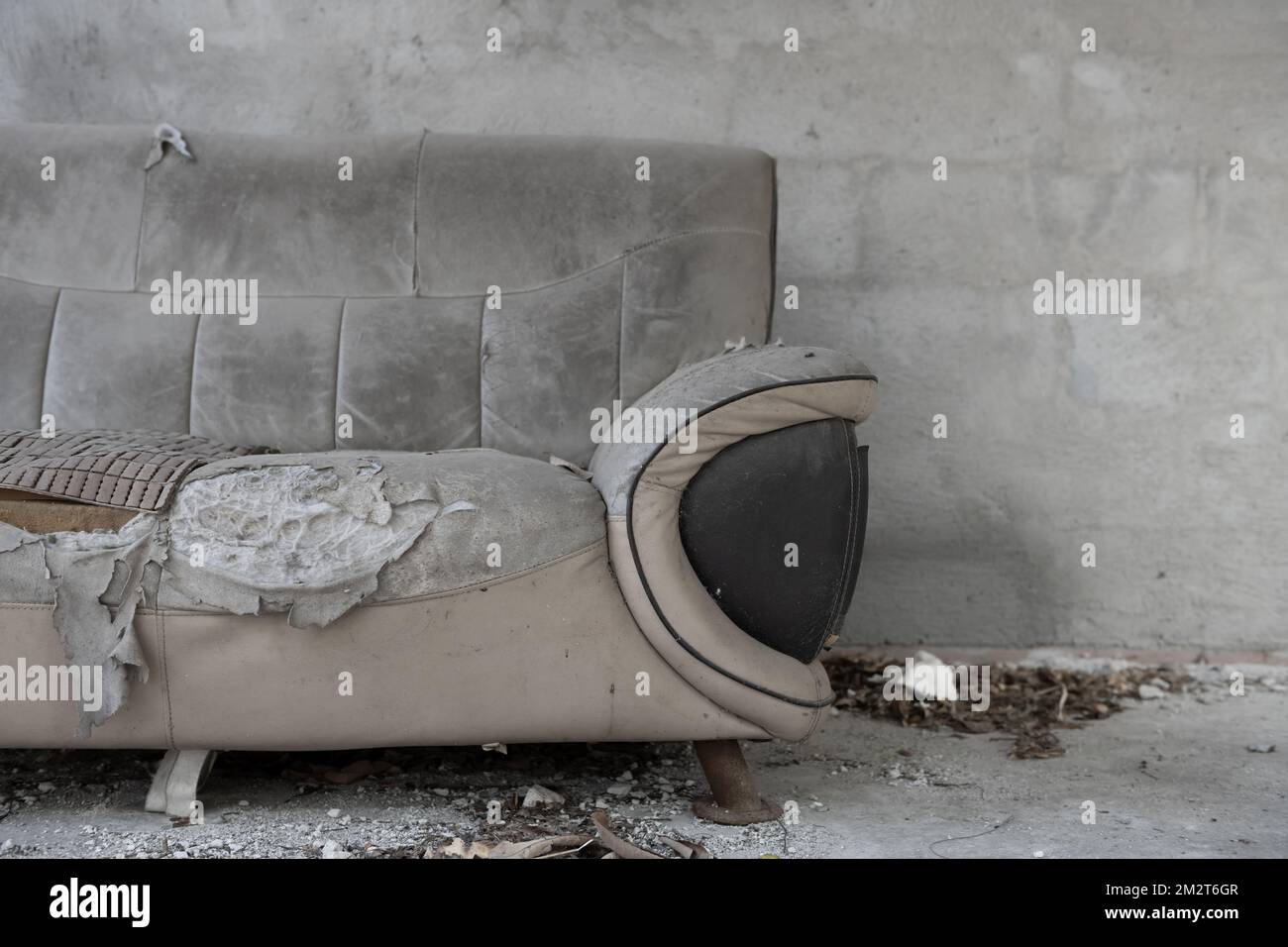 badly damaged sofa with copy space Stock Photo - Alamy