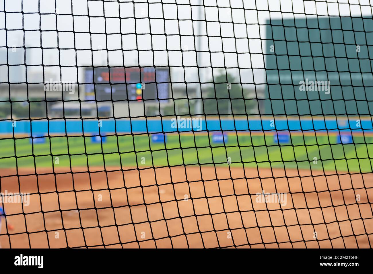 baseball field behind the netting Stock Photo - Alamy