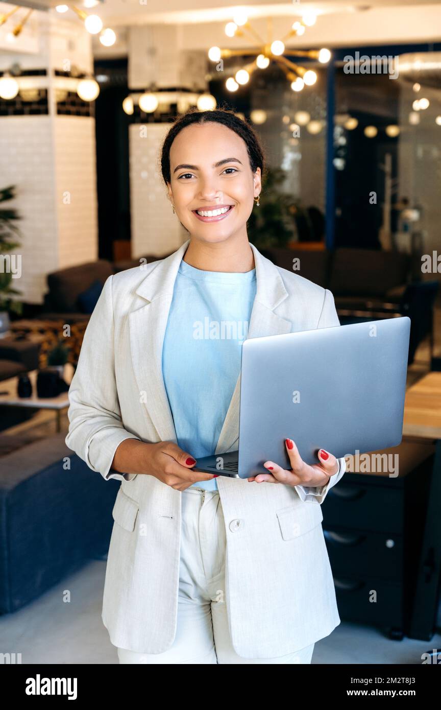 Vertical photo of a gorgeous confident successful brazilian or hispanic ...