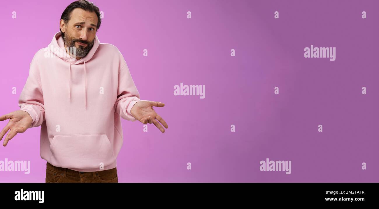 Portrait clueless unaware father cringing smirking uncertain shrugging ...