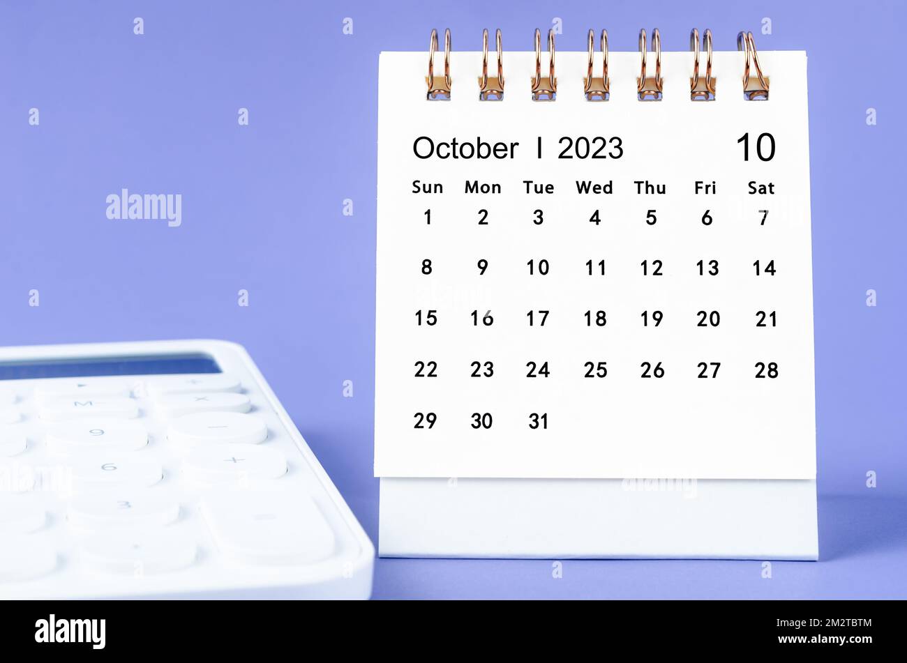 October 2023 Monthly desk calendar for 2023 year with calculator on ...