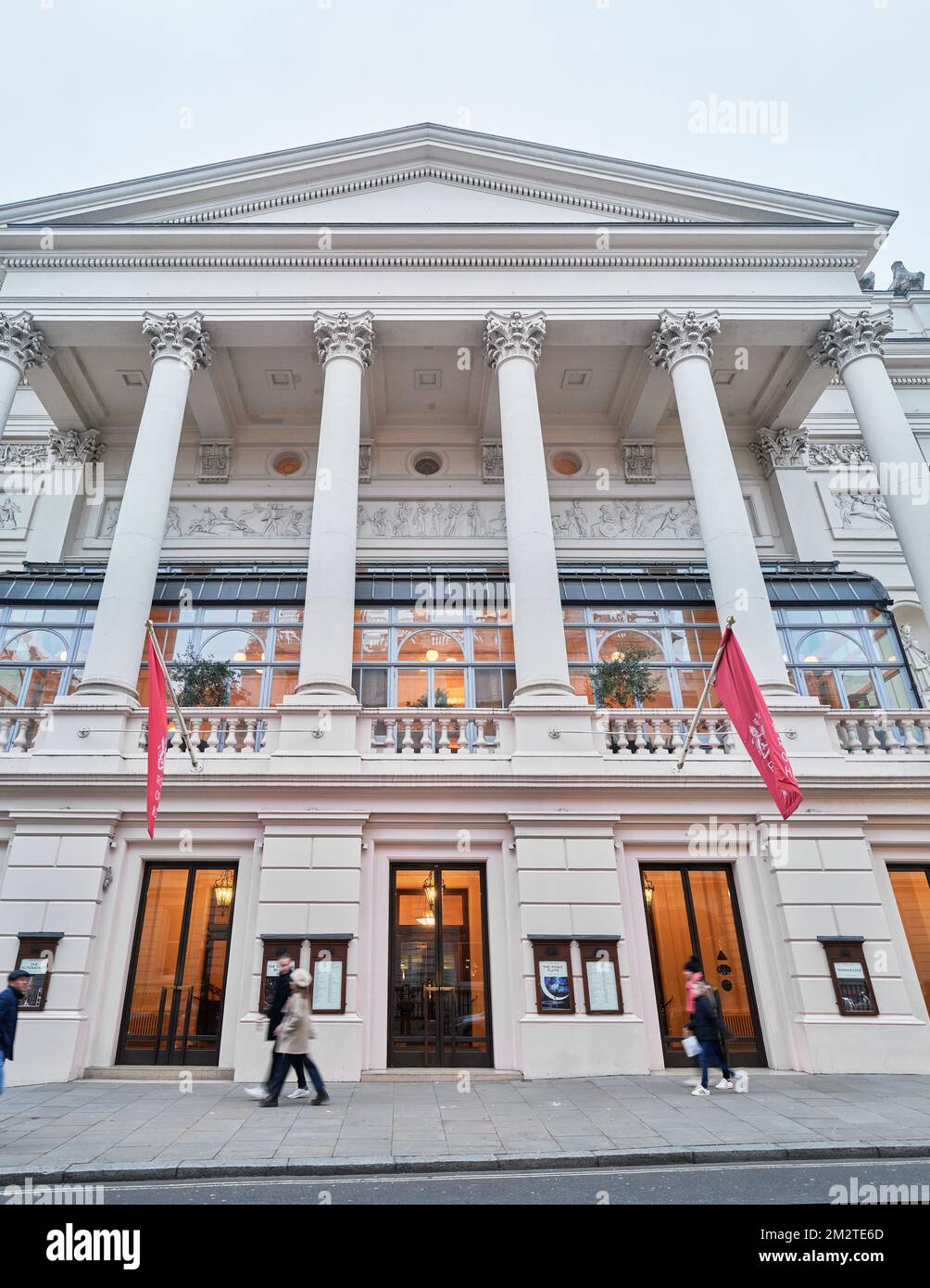 Passers-by outside the Royal Opera House, London, England Stock Photo ...