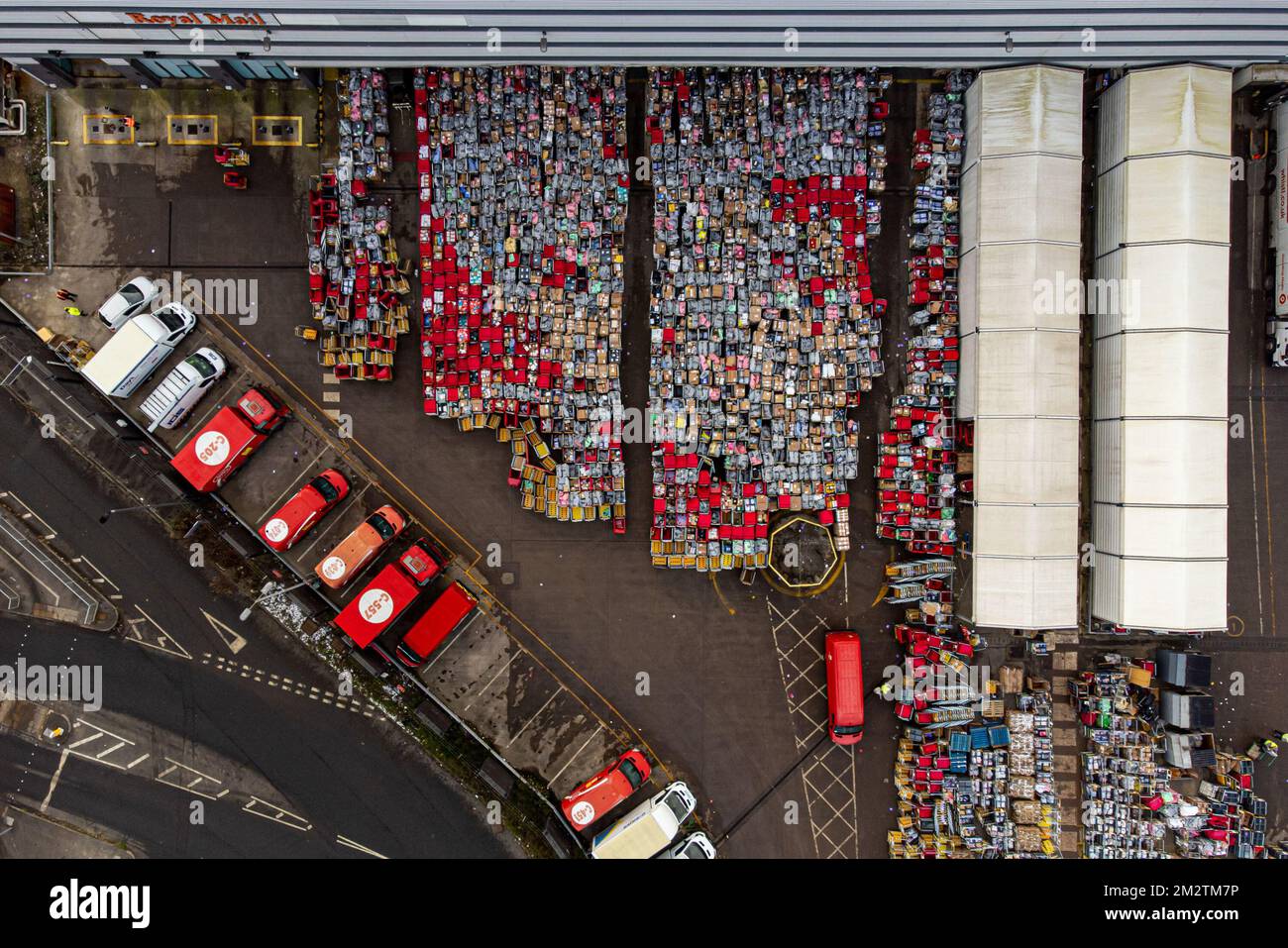 Royal Mail delivery vehicles and cages of mail at the Bristol Filton ...