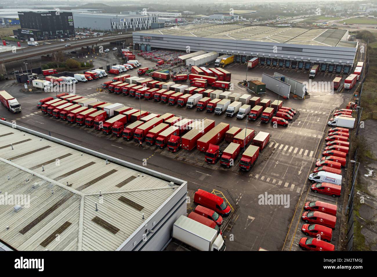 Royal Mail delivery vehicles and cages of mail at the Bristol Filton ...