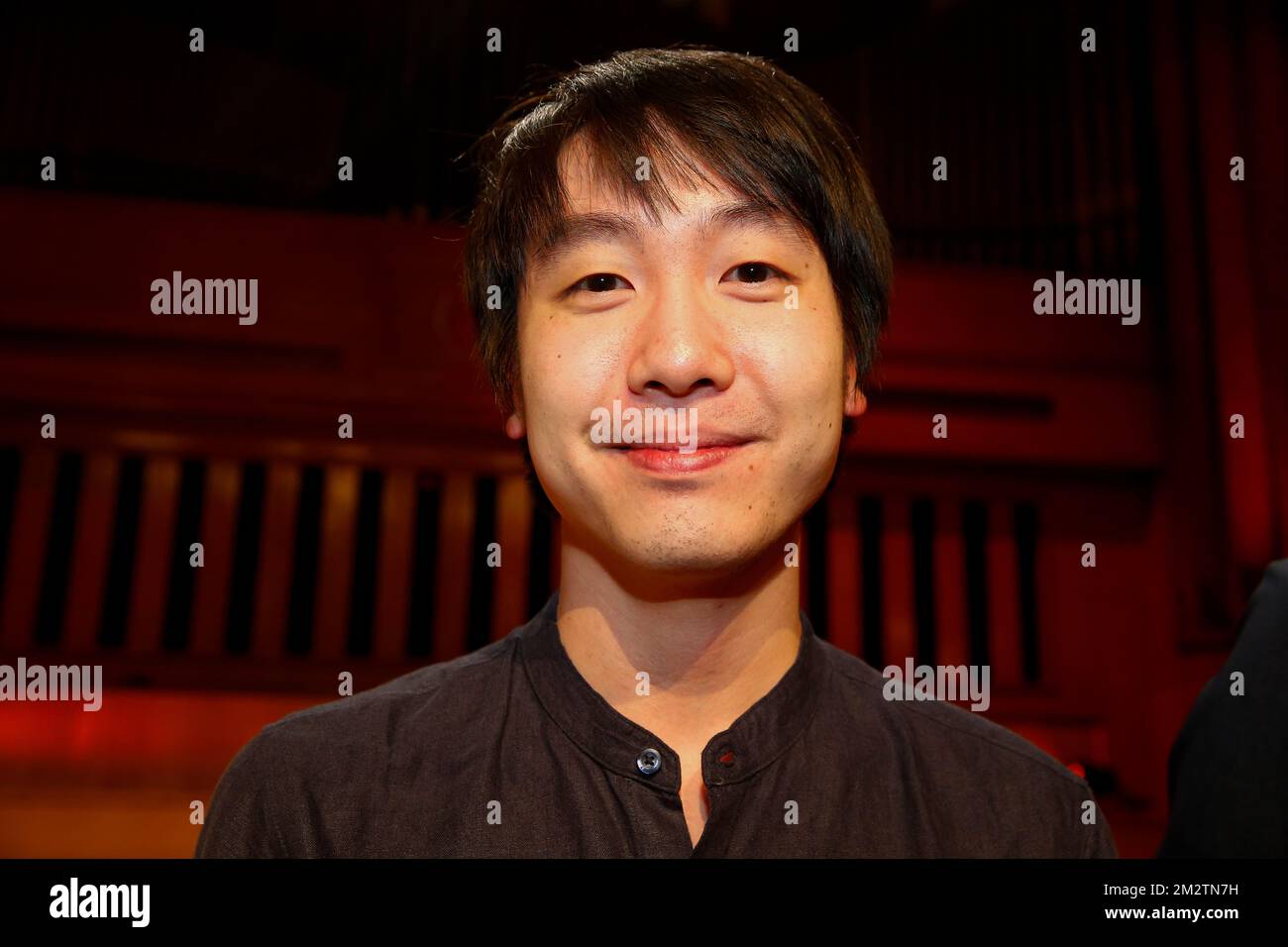 Finalist Stephen Kim poses for the photographer at the last session of ...
