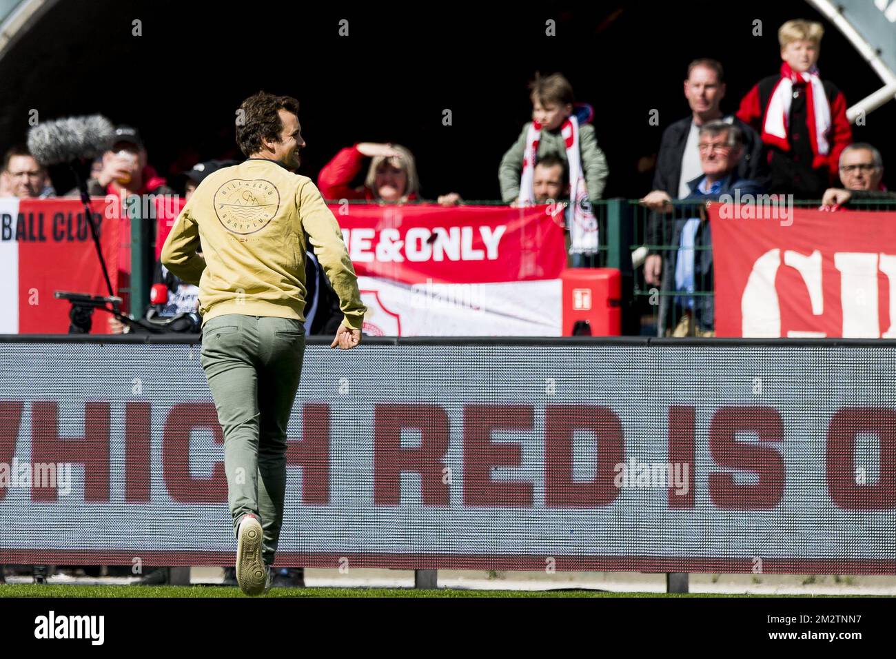 A streaker pictured ivading the pitch during a soccer match between ...