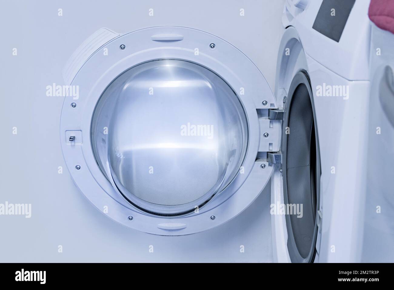 Household washing machine to the left corner installation against the ...