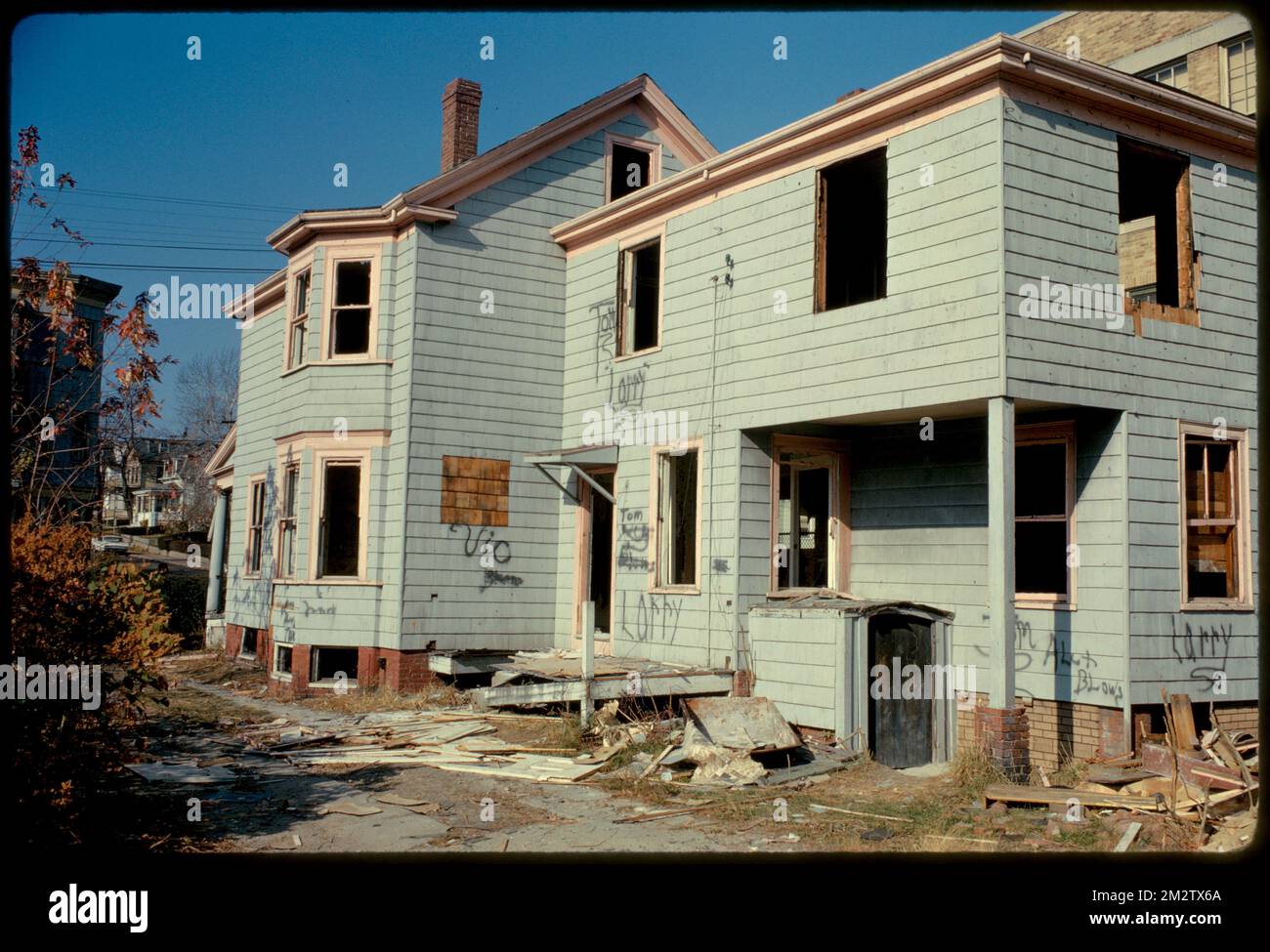 Exterior of dilapidated house with graffiti on walls, Somerville ...