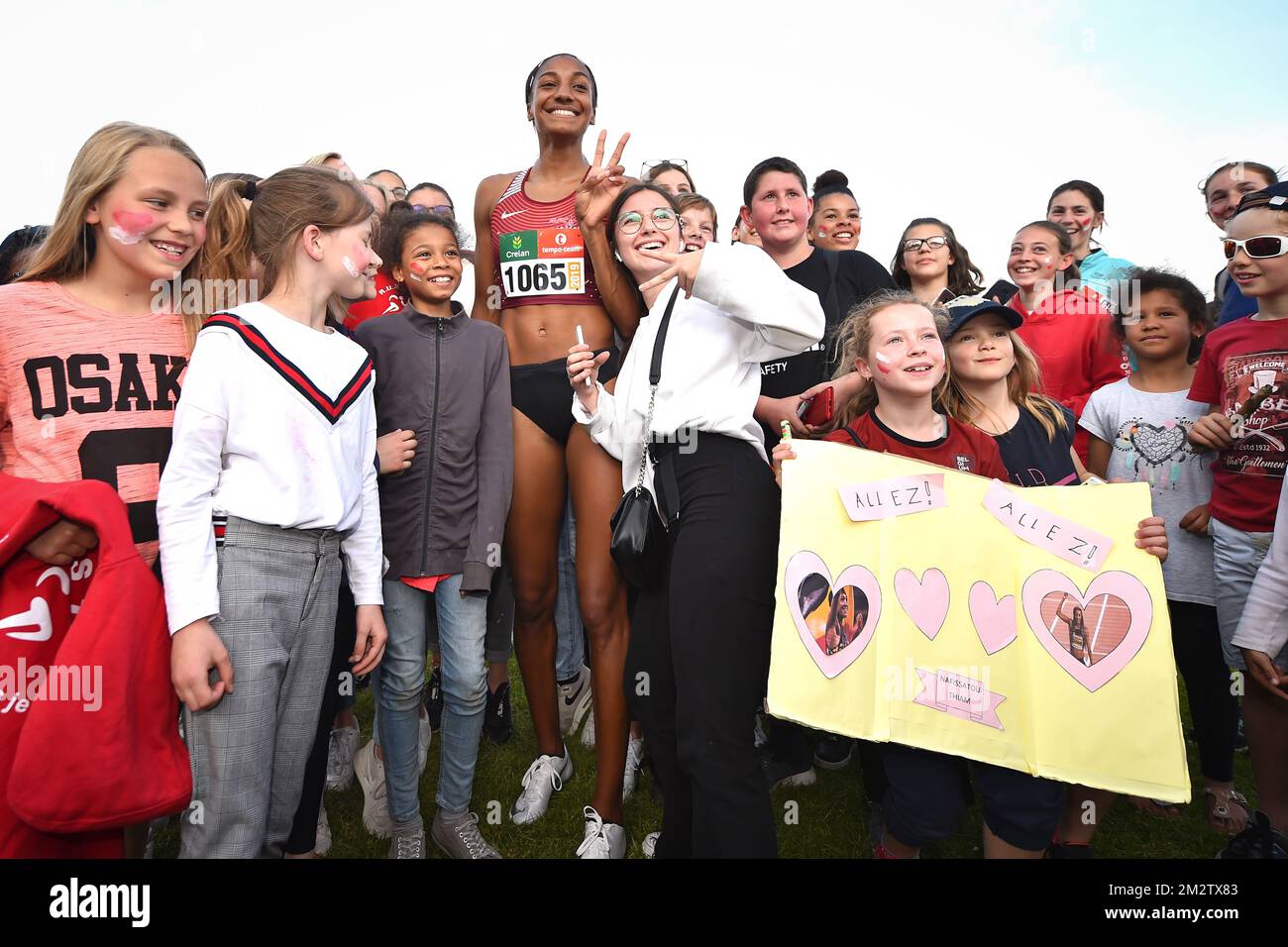 Belgian athlete Nafissatou 'Nafi' Thiam (C) meets young fans after the ...