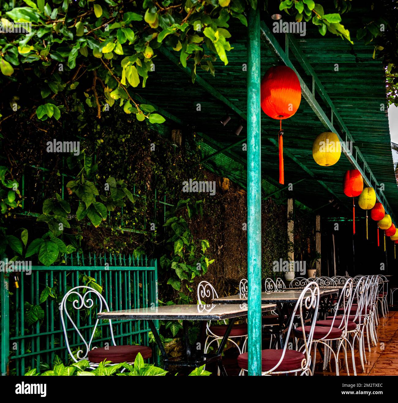 Old Town restaurant covered eating area with wrought iron chairs and ...
