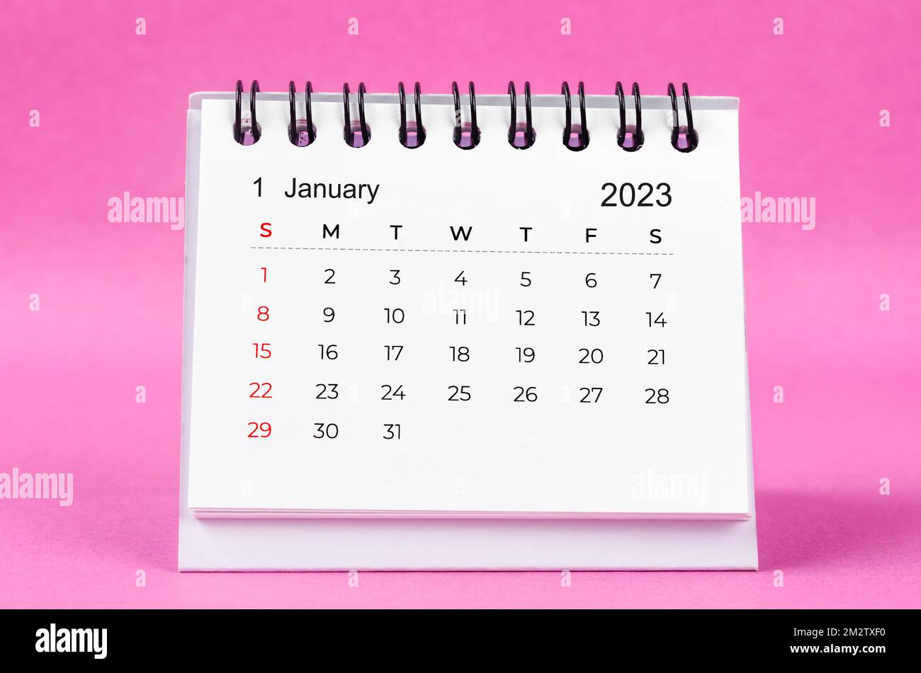 January 2023 desk calendar on pink color background Stock Photo - Alamy