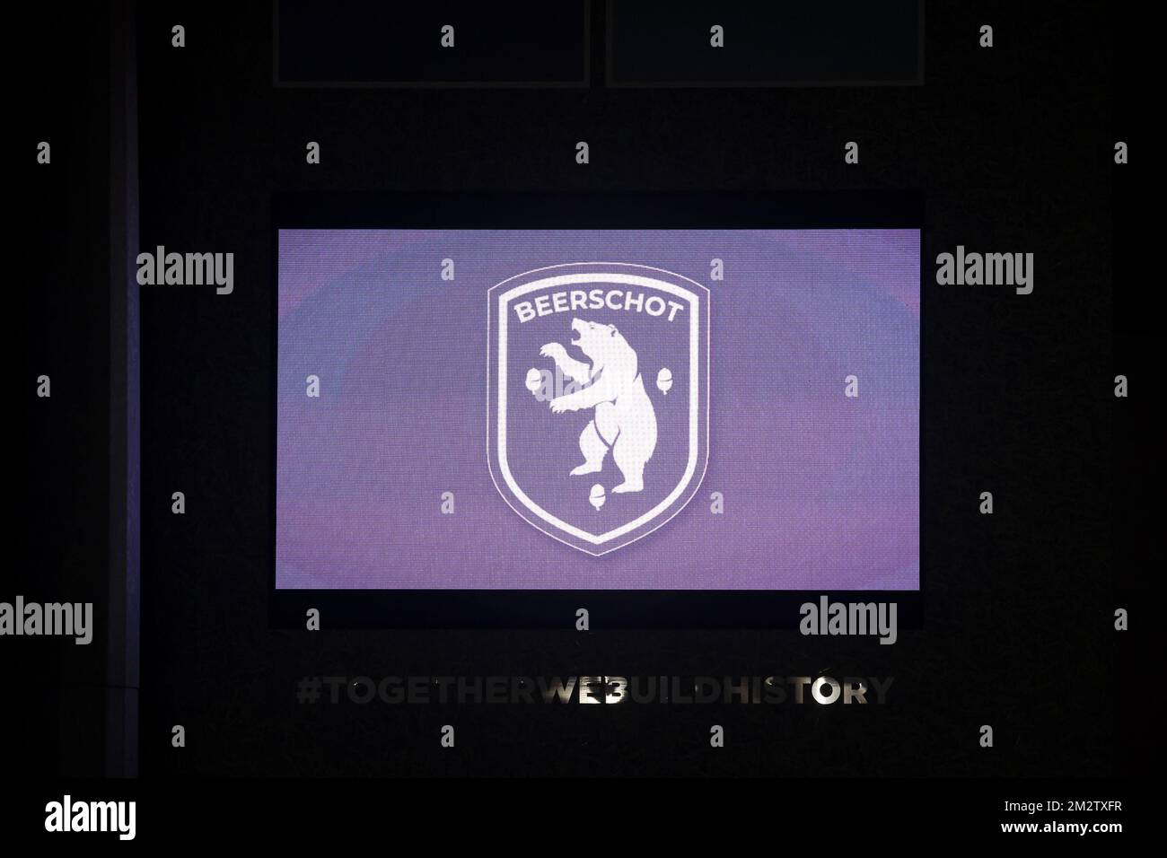 Beerschot's new logo pictured on a giant screen after a soccer game ...
