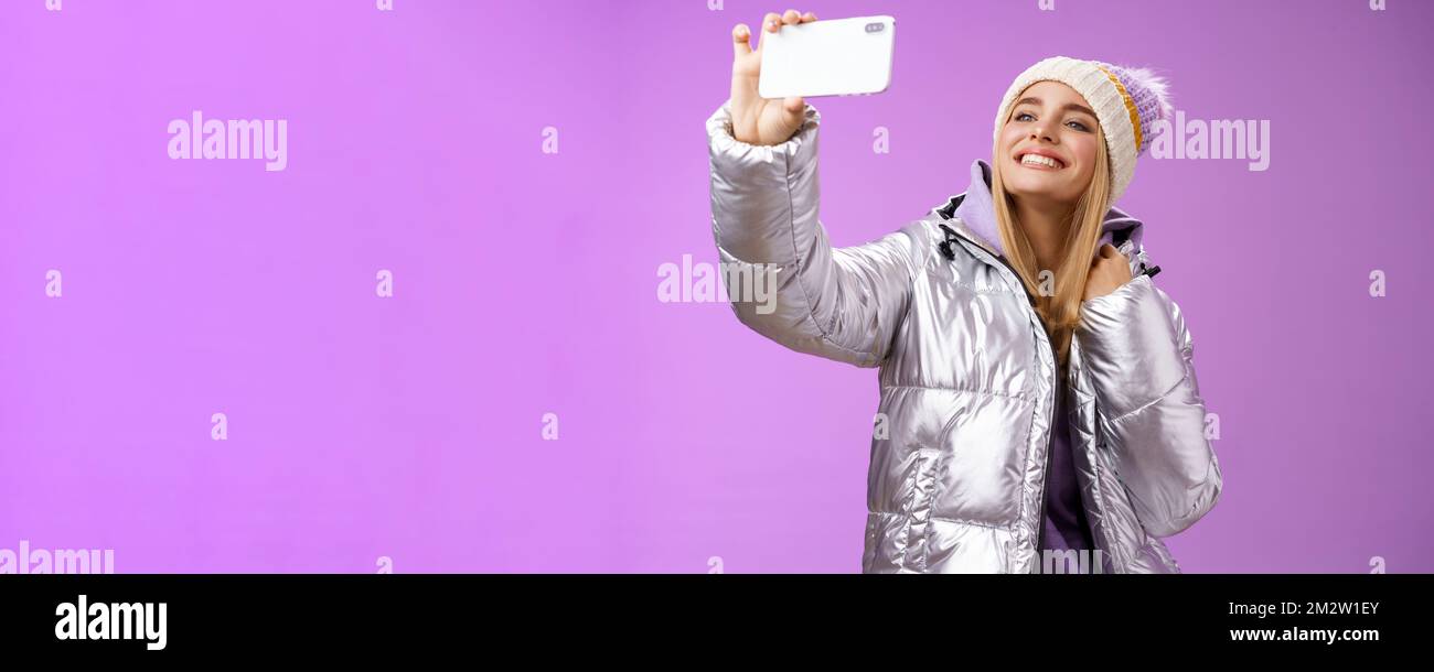 Happy delighted carefree fair-haired charming european woman in silver ...